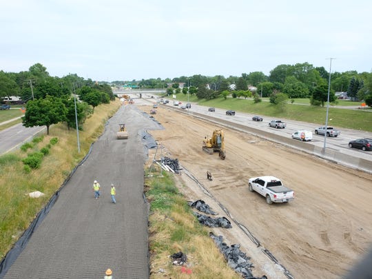 I-696 crews remove half-mile of new concrete