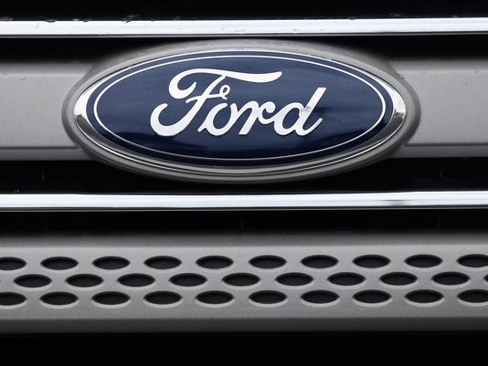 Ford announces $1.7B quarterly profit, deep cuts to car lineup