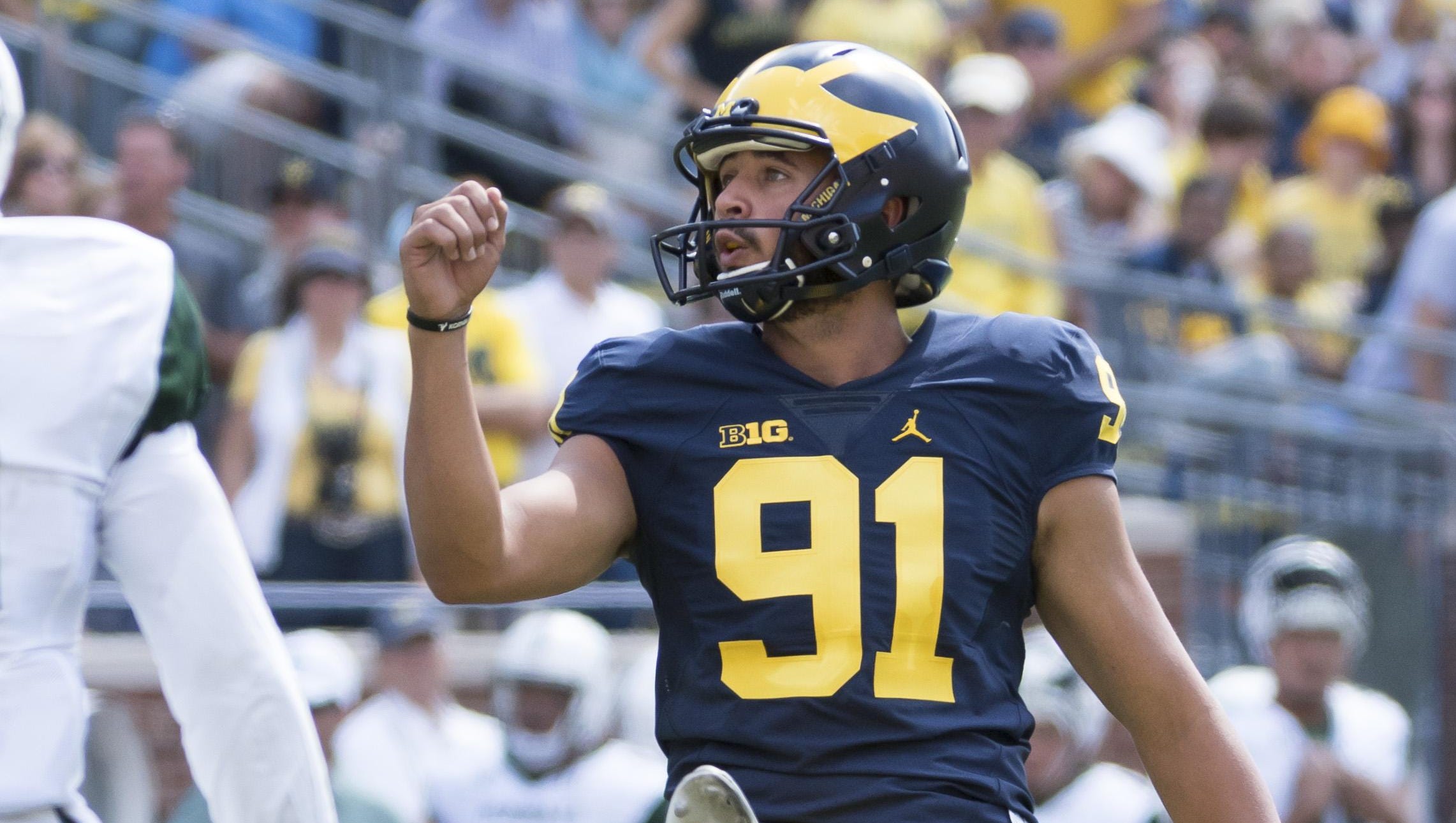 Michigan’s Allen is rare kicker as triple threat