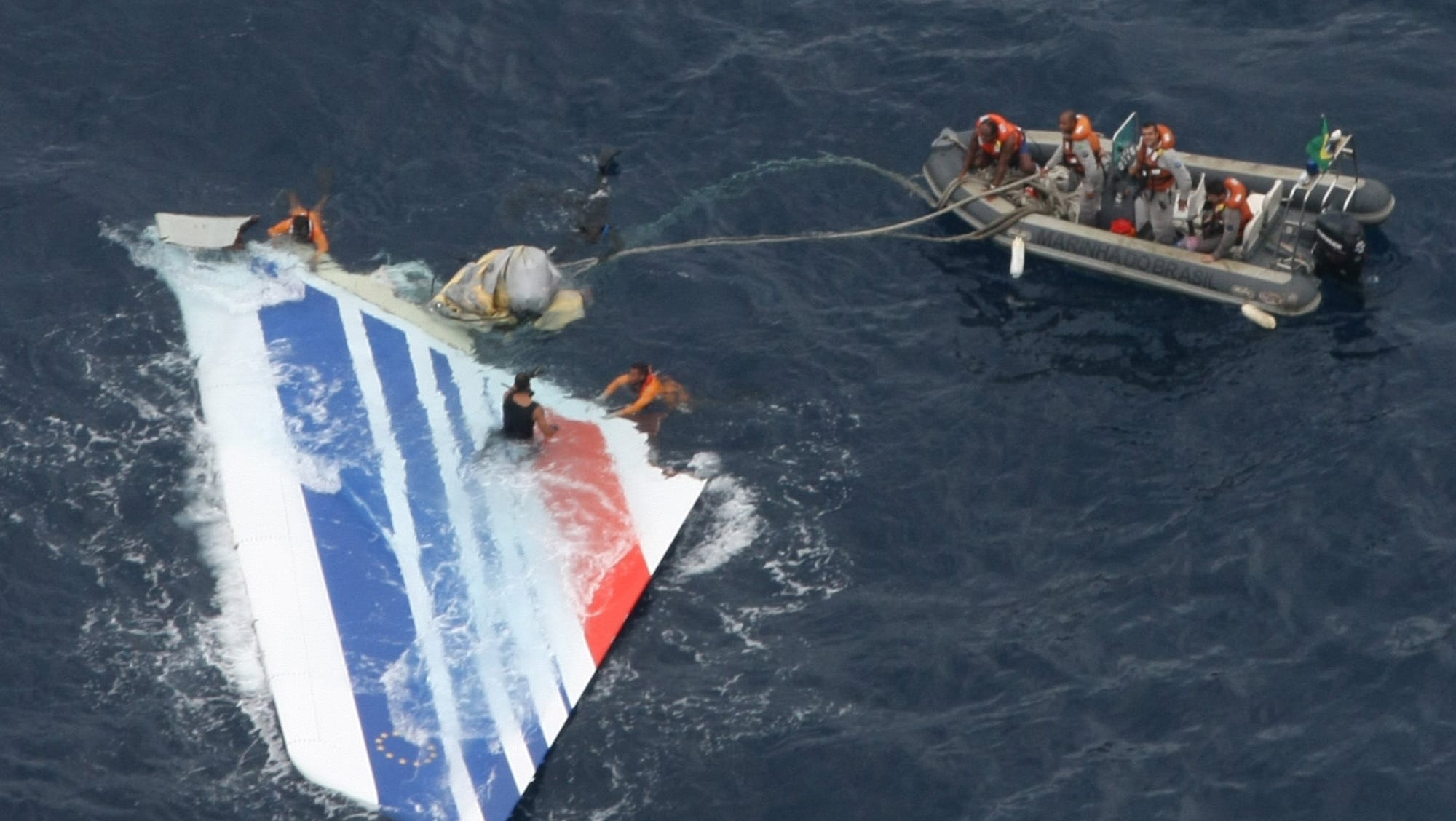 Recovering plane wreckage from water an arduous task