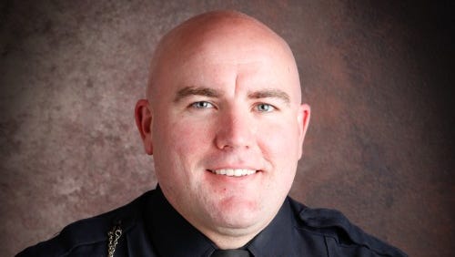 Cop 'moons' Clinton sign, spurs free speech debate