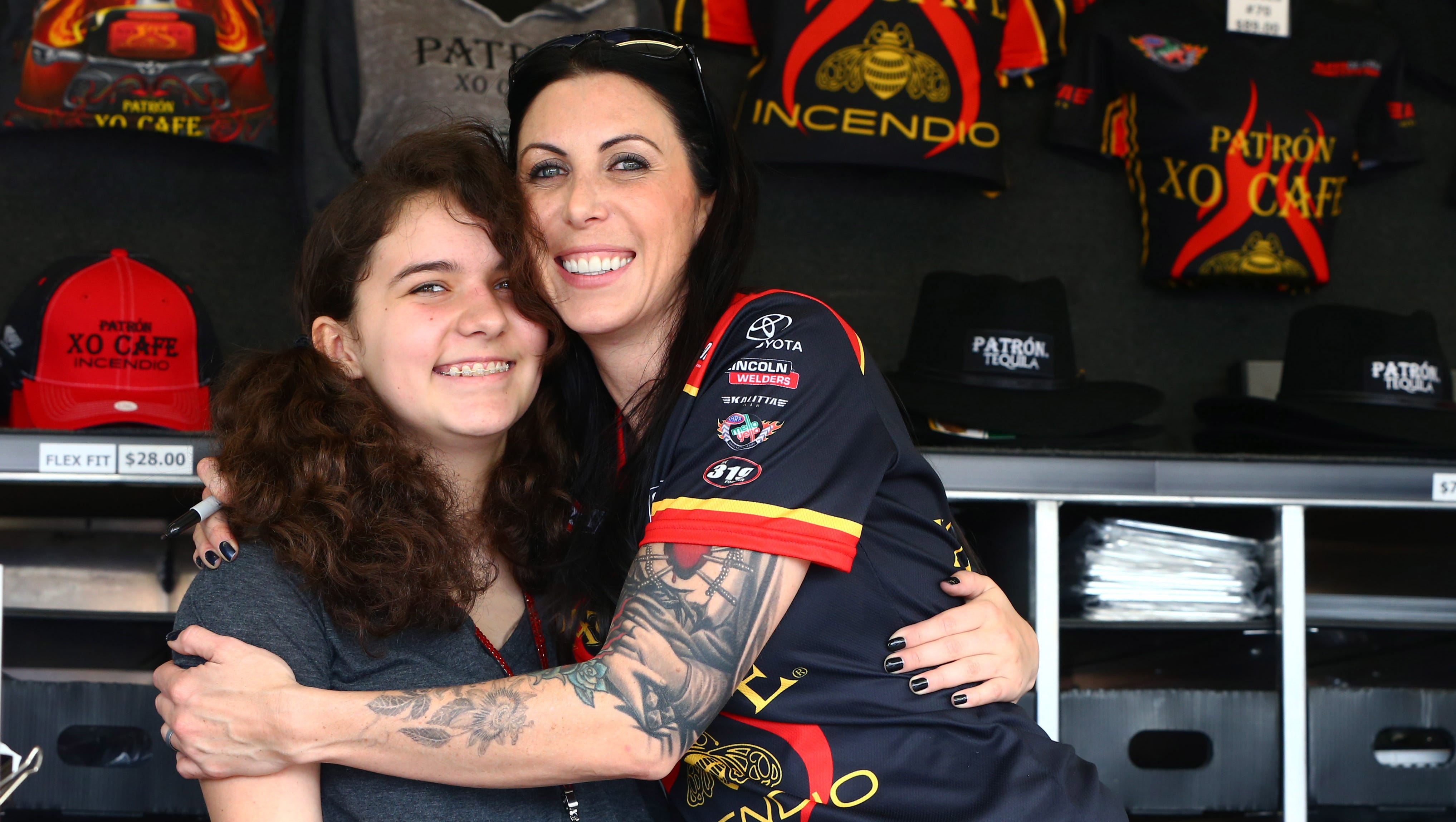 NHRA funny car driver Alexis DeJoria, right, with daughter Isabella ...