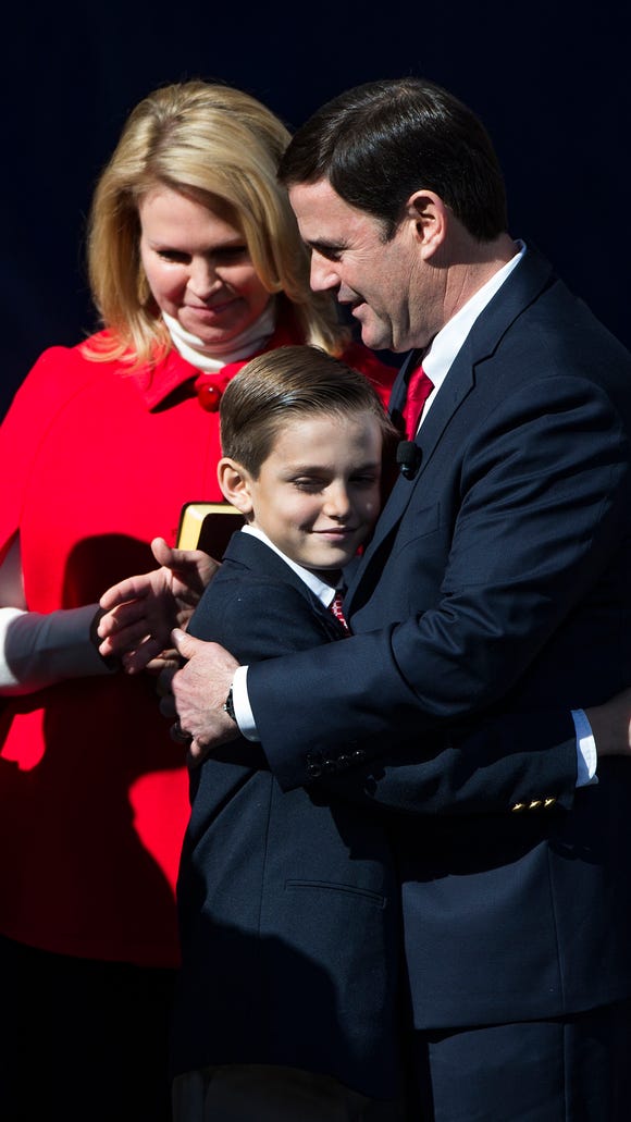 Can Doug Ducey tout cuts and compassion?