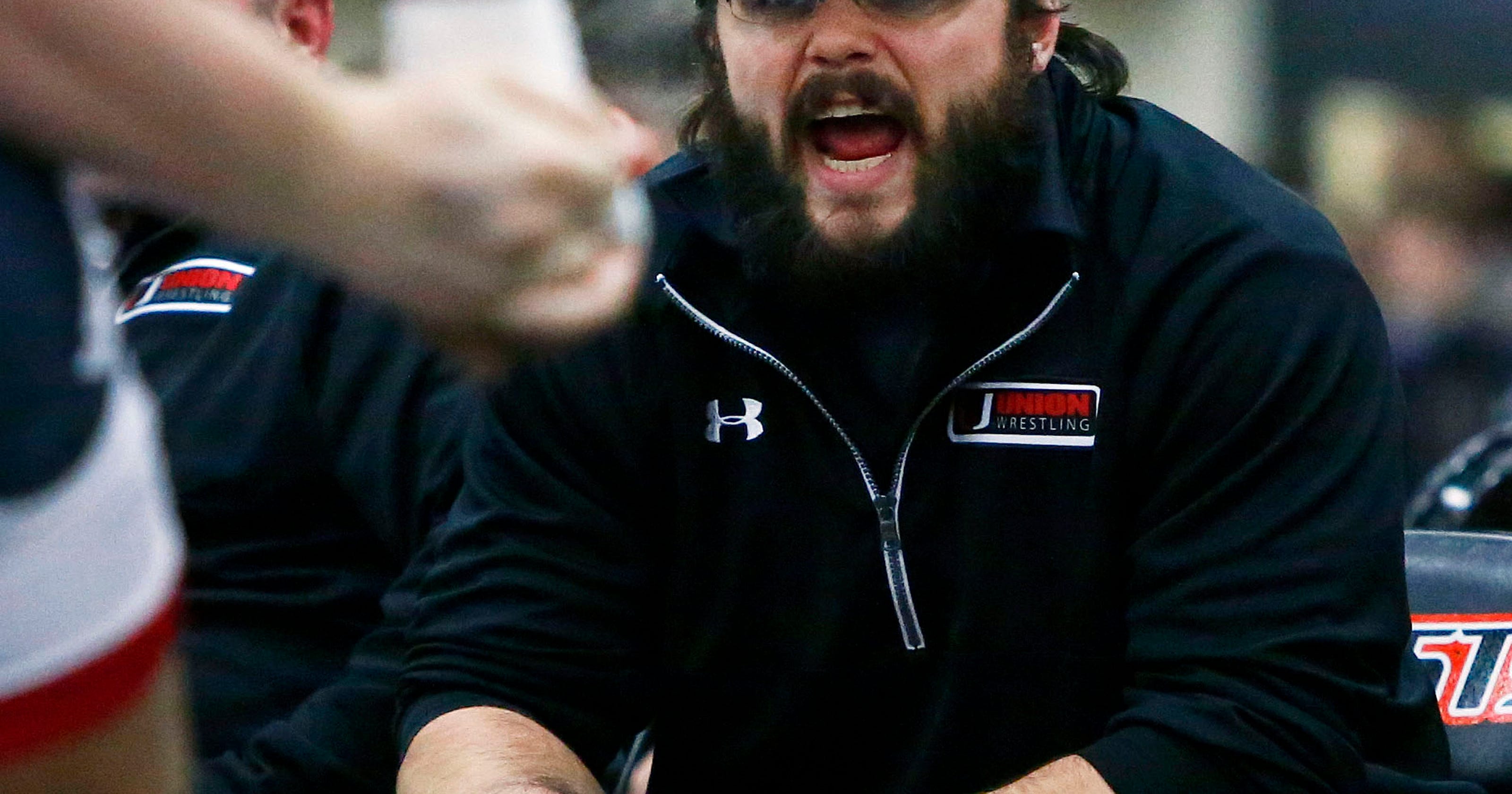 Neenah native Tim McCarthy enjoying coaching
