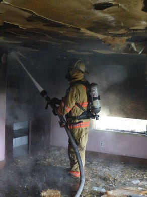 House with grisly past burned in training exercise