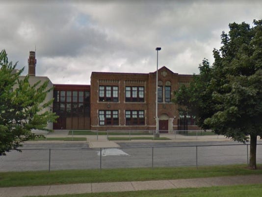 Detroit school water draws teacher lawsuit