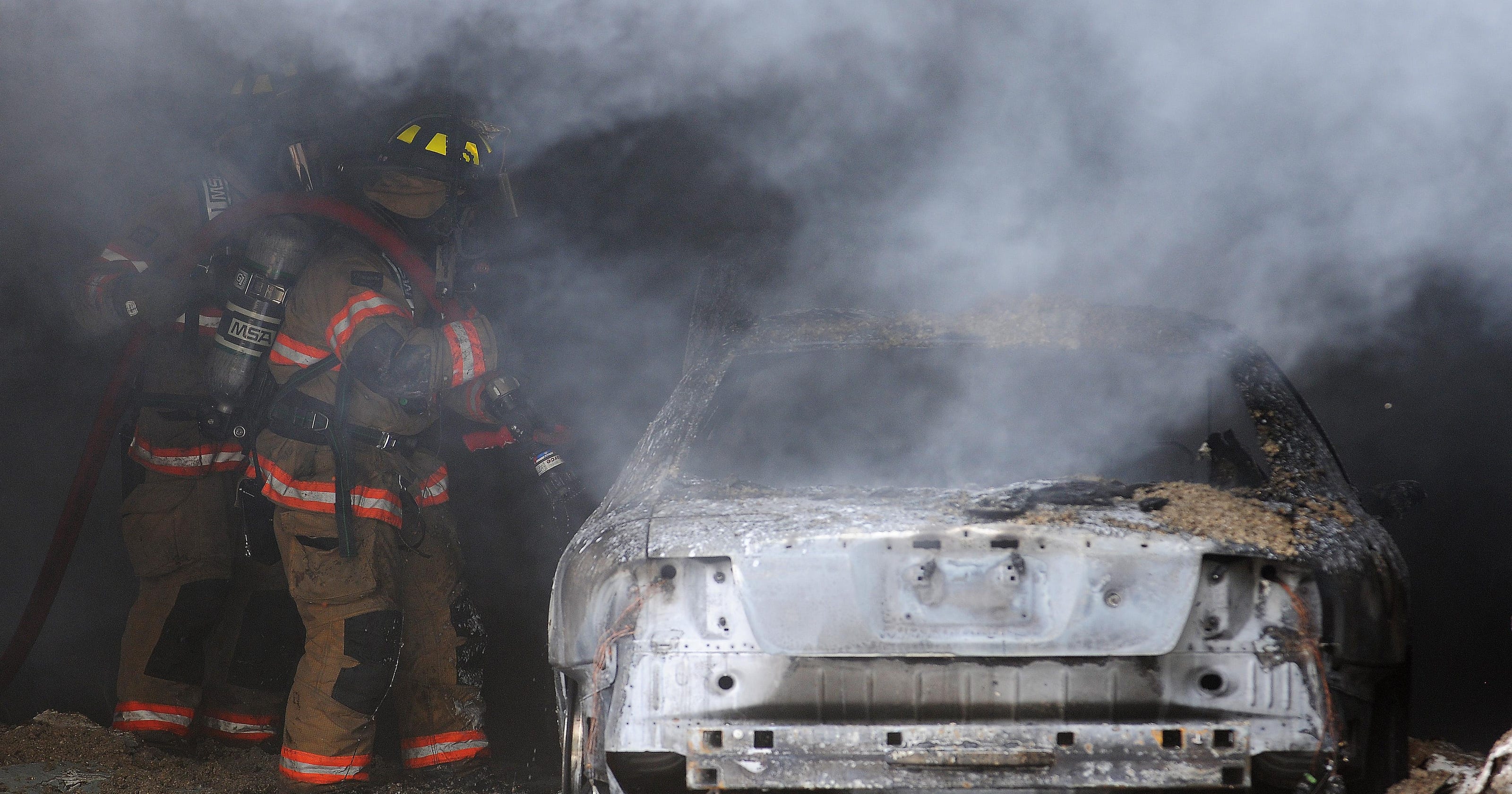 Garage, car destroyed by fire
