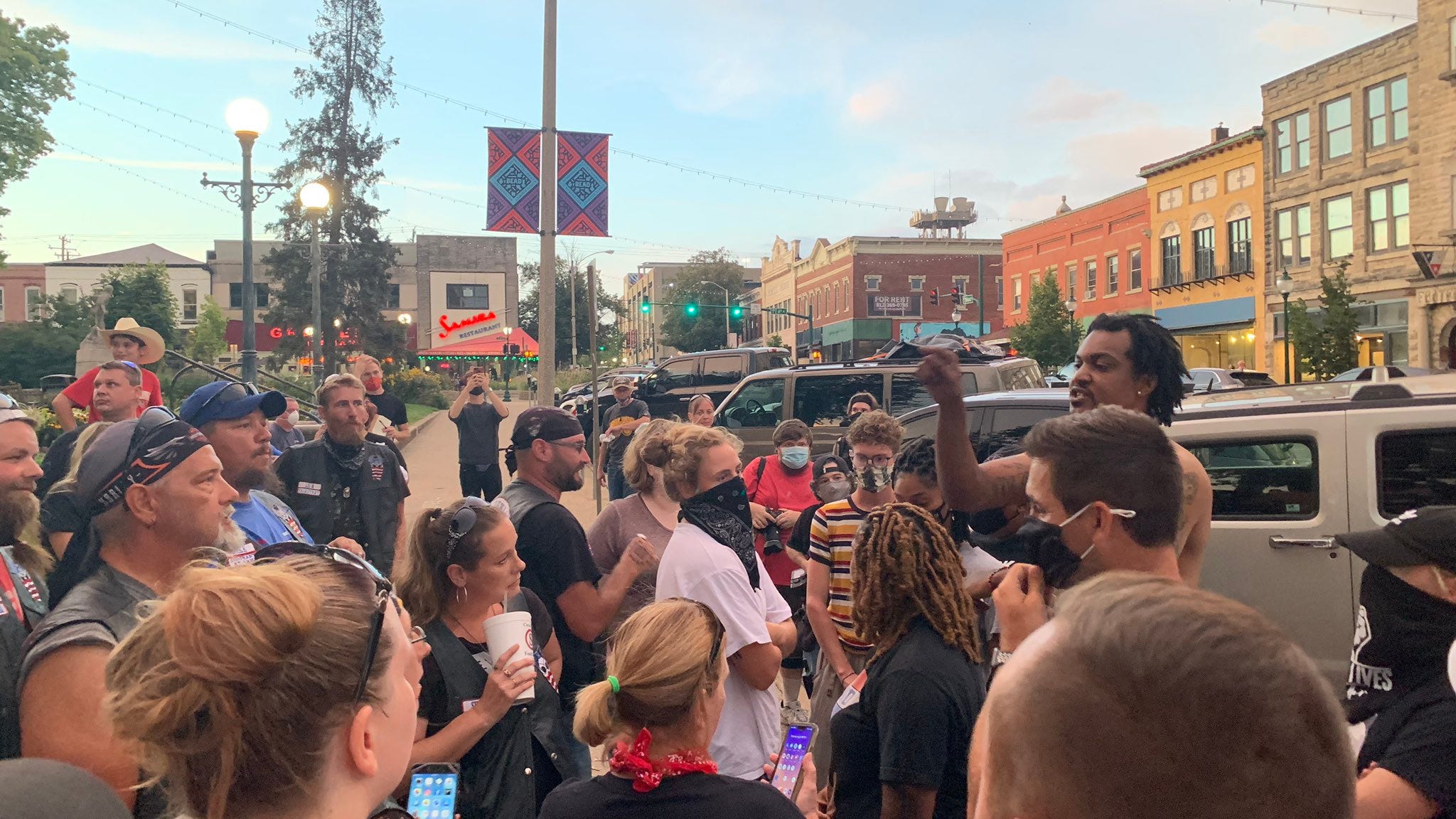 Fighting erupts at downtown rally