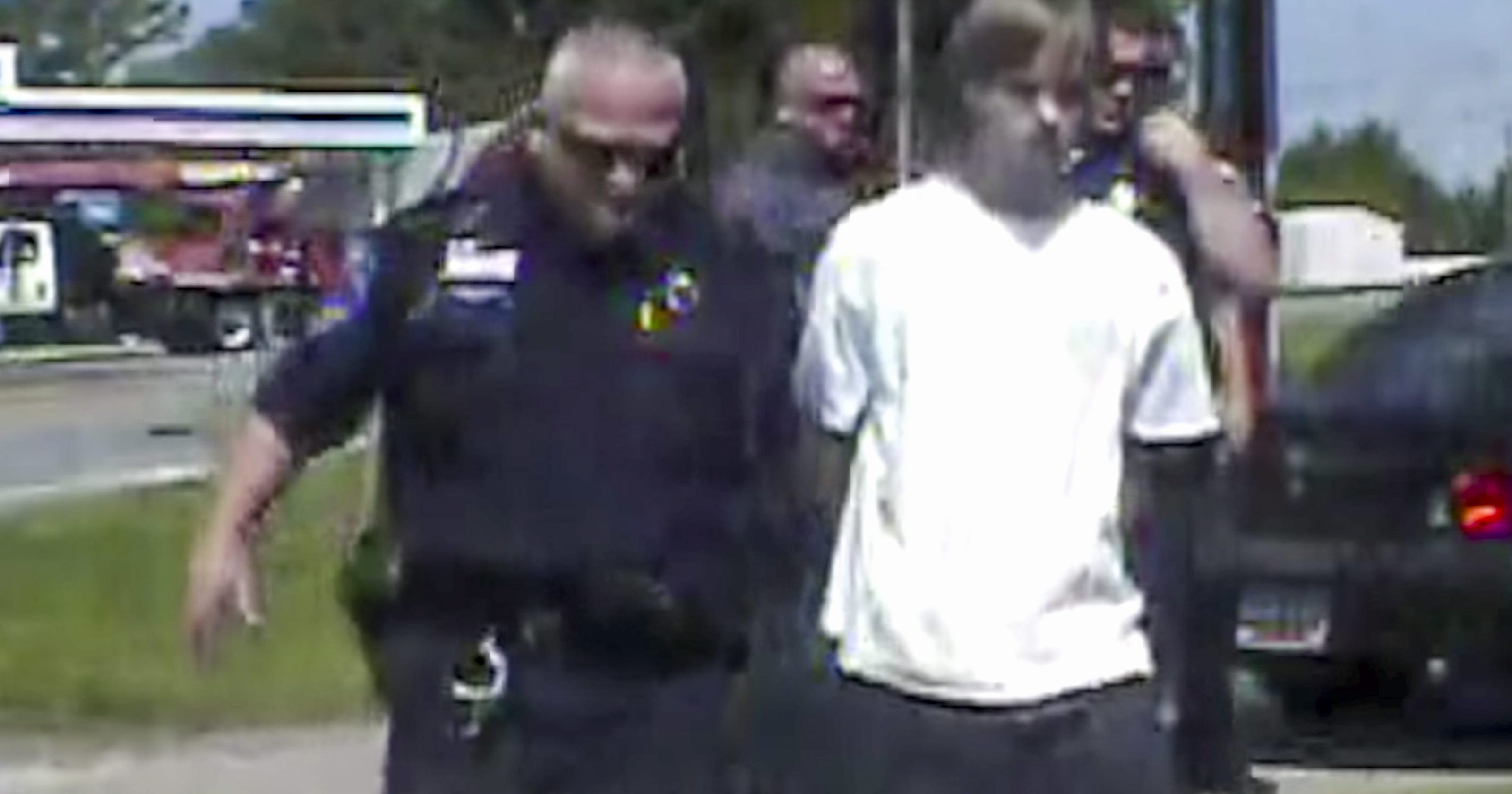 Dash-cam video shows arrest of accused church shooter
