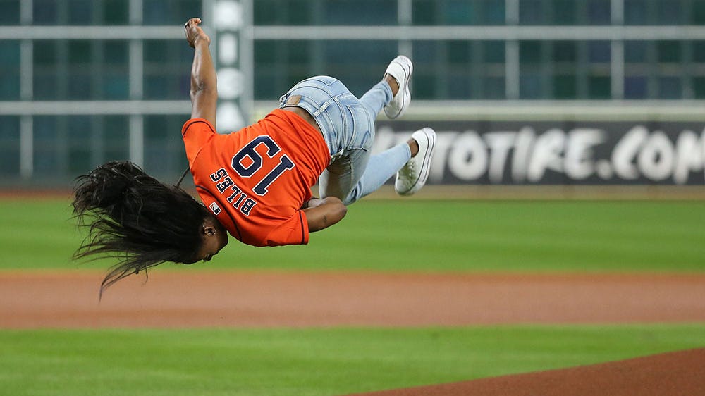 World Series: Simone Biles backflips, then throws out first pitch