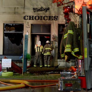 Woman rescued after car gets stuck in power lines