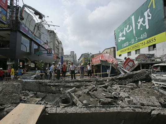 Taiwan gas explosions kill 24; blows car onto roof