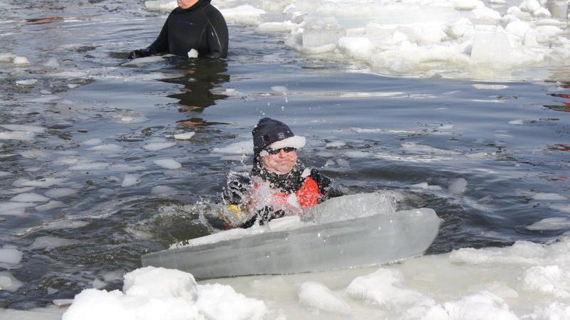 Polar Plunge takes on new meaning at ice-covered Indiana lake