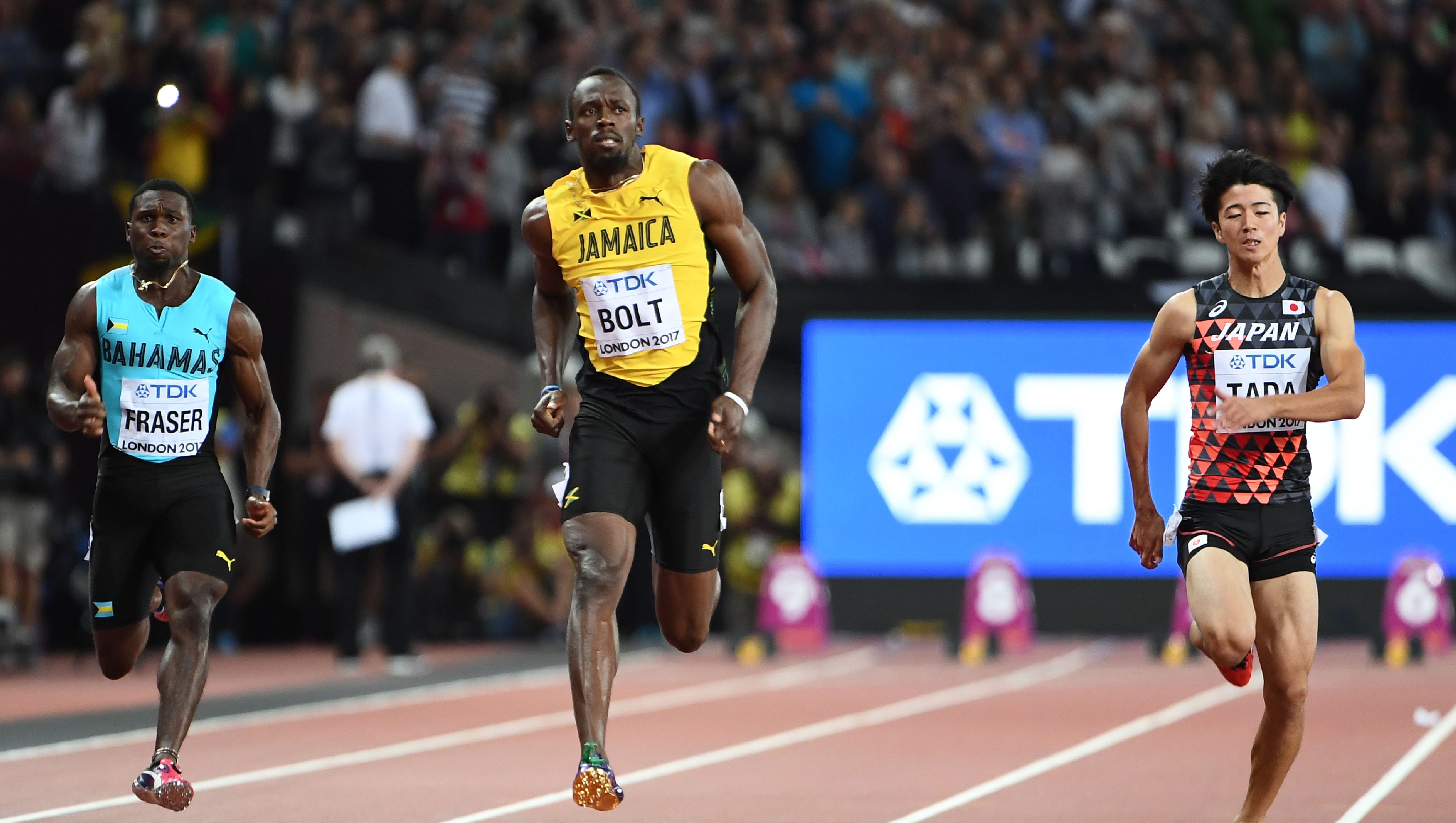Usain Bolt advances to 100-meter semifinals in his final championships