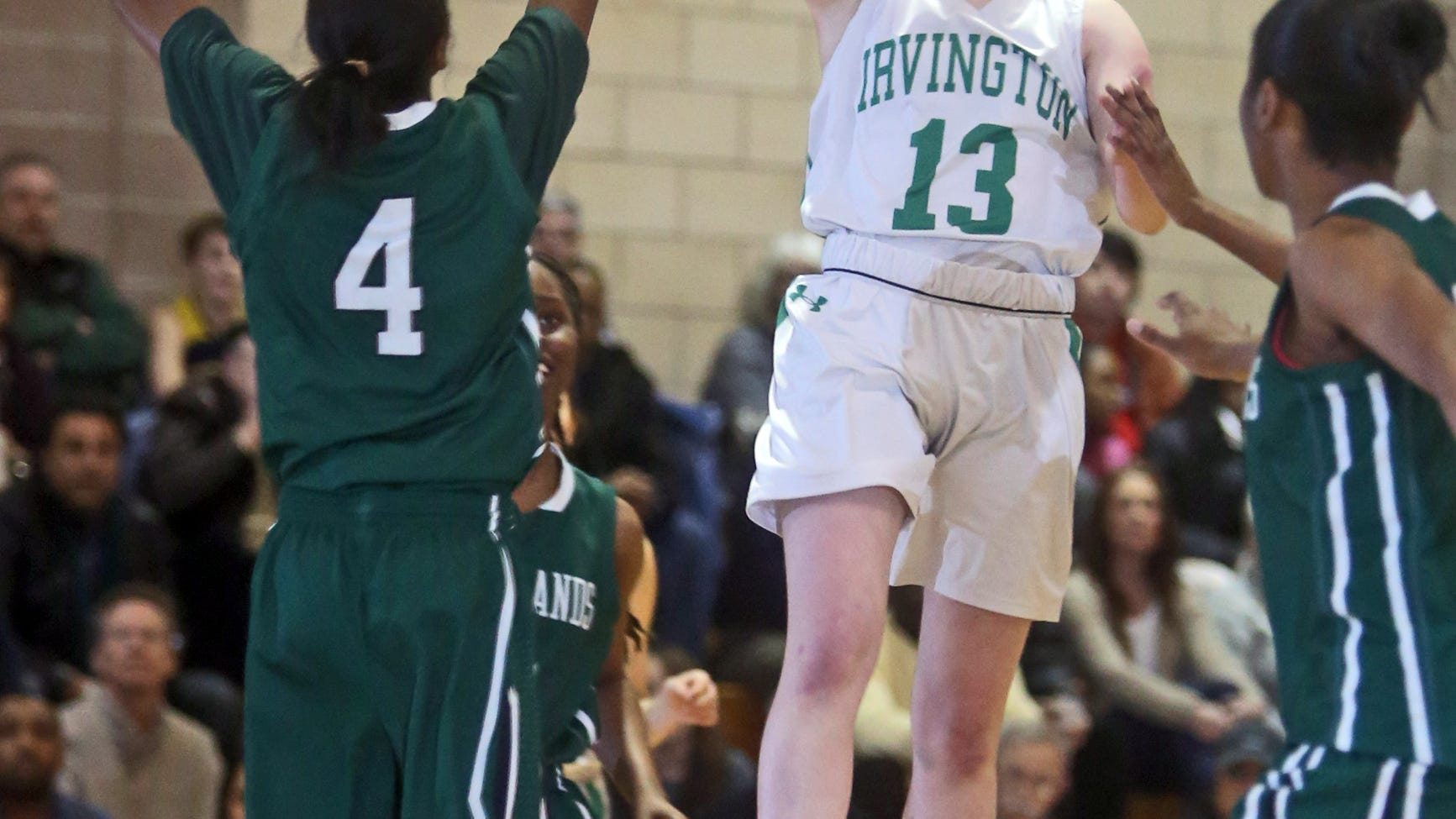 Halpin rinses off blood, then leads Irvington to win