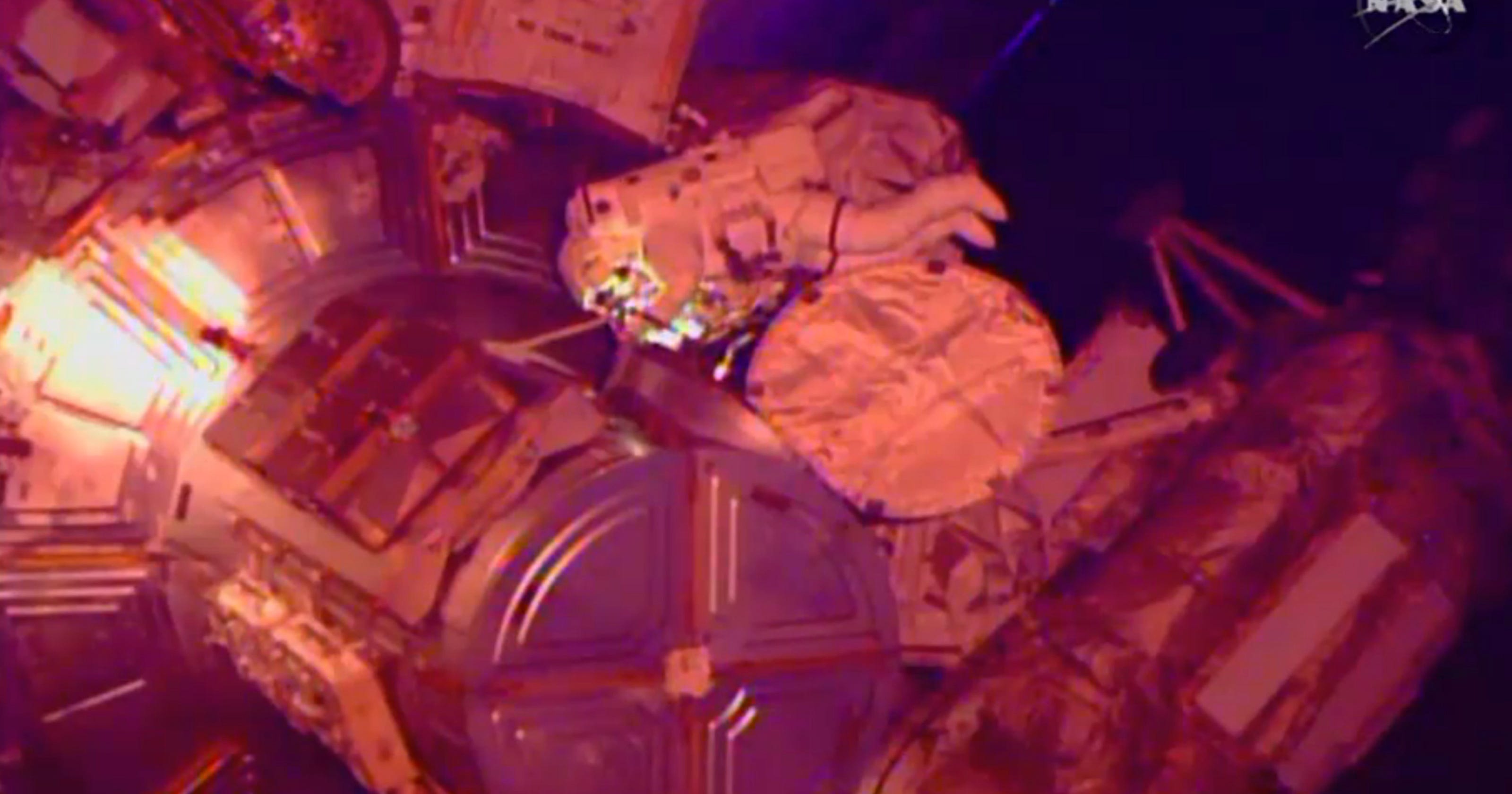 Astronauts begin spacewalk to lay cable at ISS
