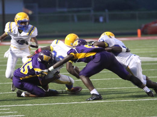 Wossman rides Thomas to win over Carroll