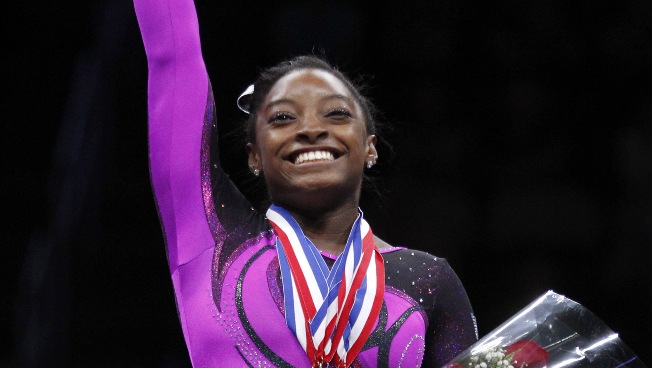 World gymnastics champ Simone Biles turns pro ahead of Rio Olympics