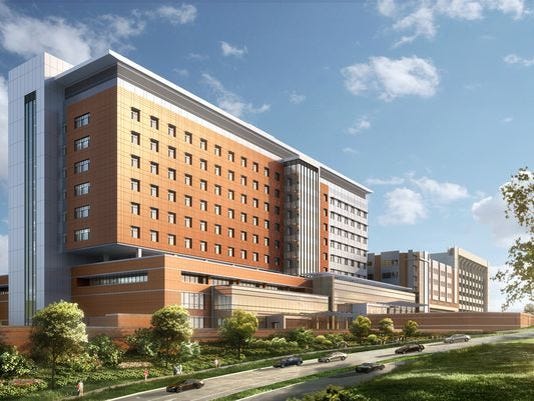 New 12-story Mission Health tower gets final two beams placed