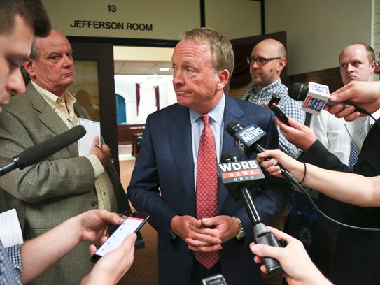 University of Louisville interim President Greg Postel has no regrets