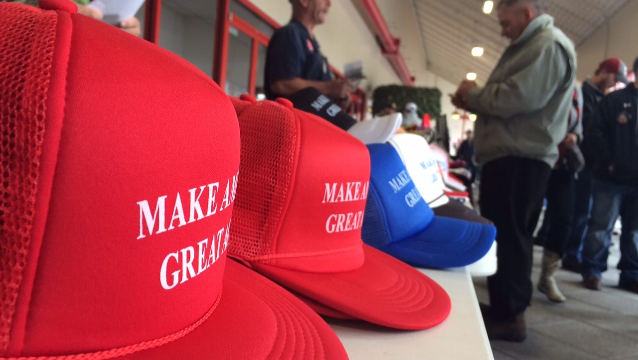 Supporters, protesters greet Trump in Rothschild