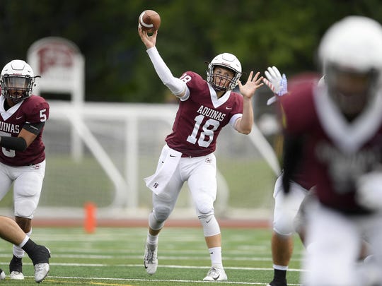 Tyler Szalkowski almost shatters records in Aquinas victory