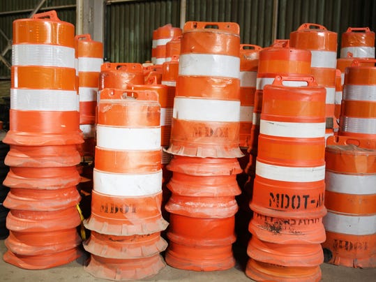 State may pay big bucks for brighter orange barrels