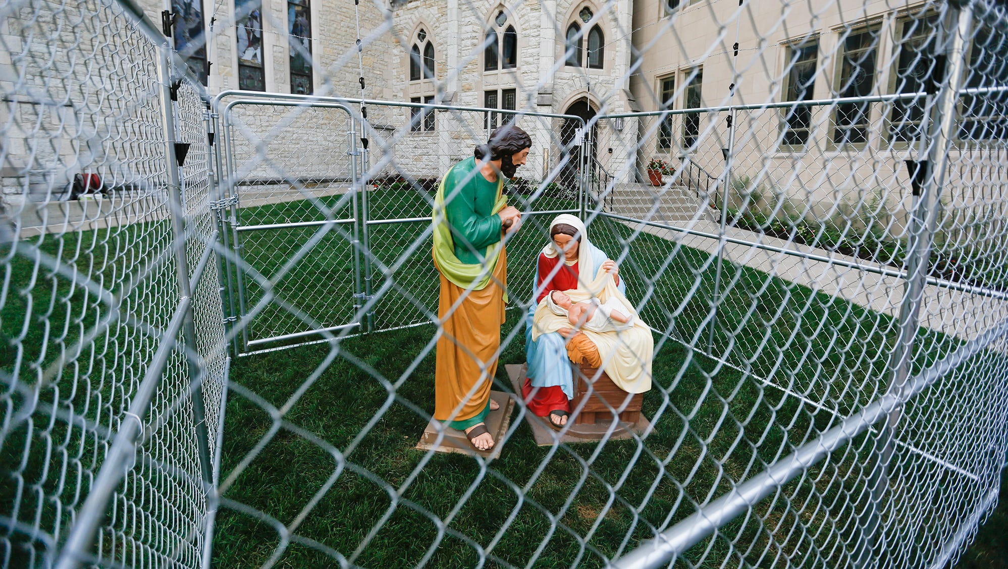 Protesting immigration policy, Indianapolis church puts Jesus in cage