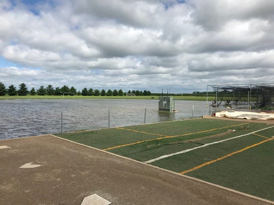 Metro-area schools report damage from storms, flooding