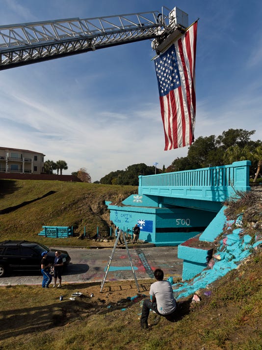 Graffiti Bridge turns blue for beloved paramedic