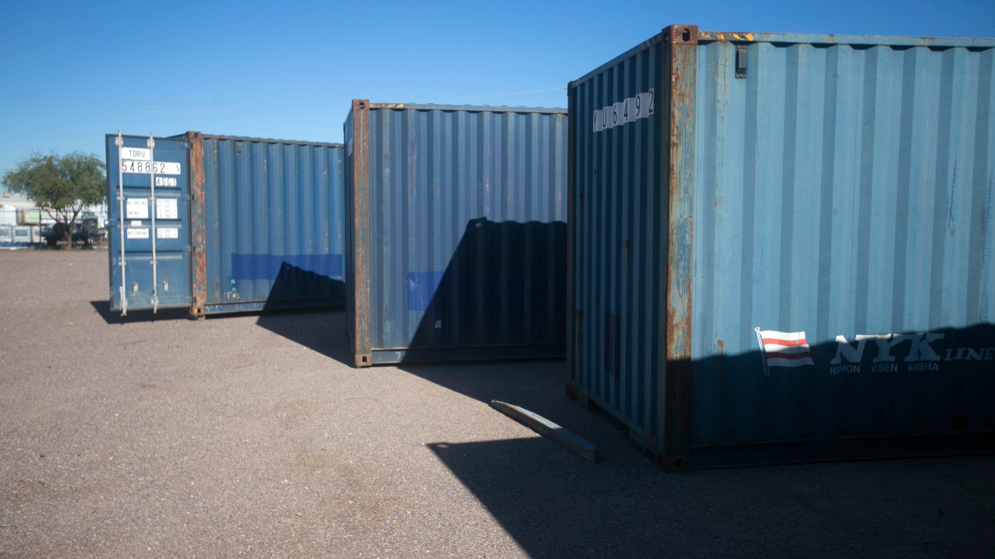 Cargo containers center of Grand Ave. housing project