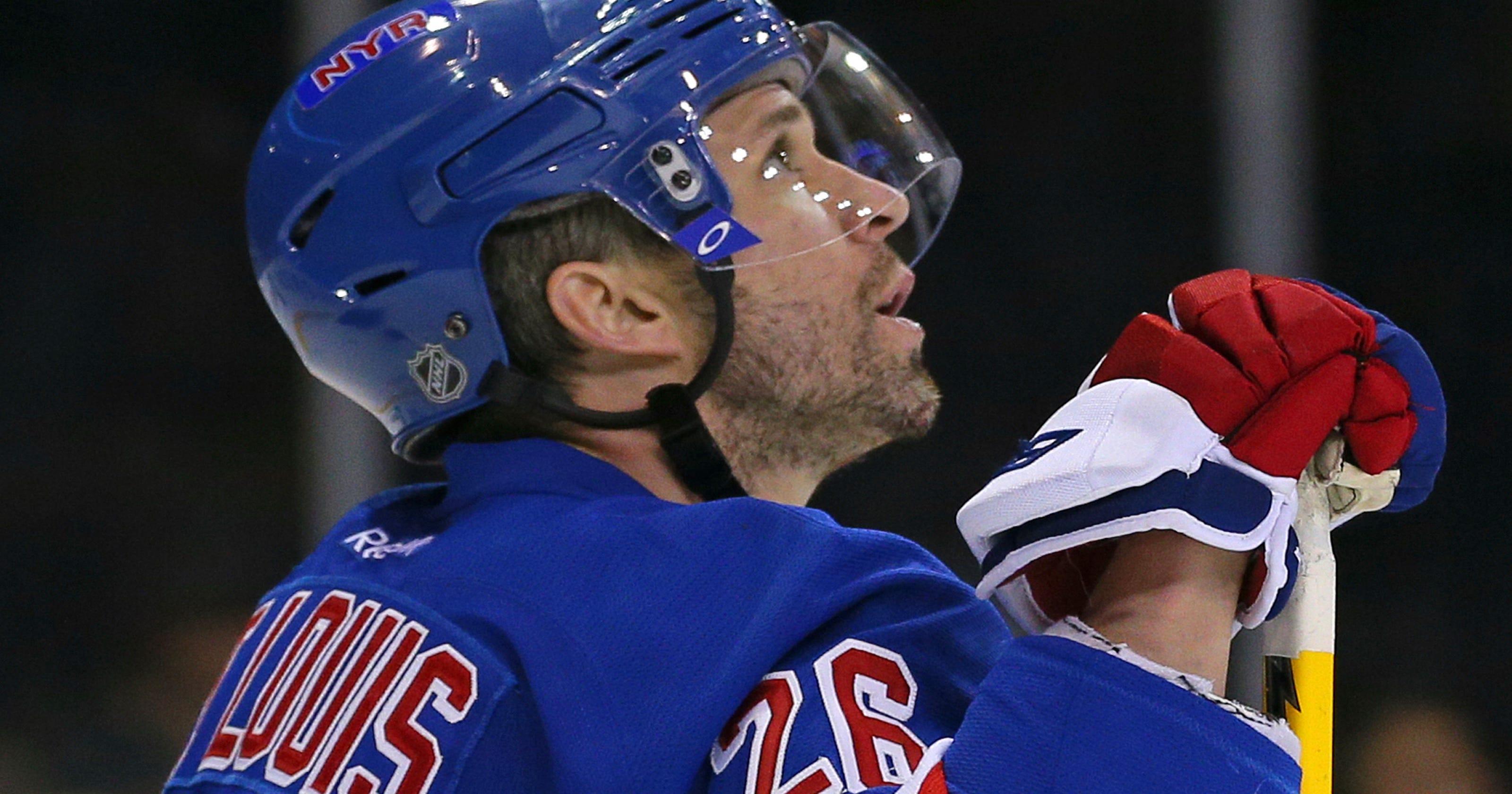 Martin St. Louis suits up after mother's death