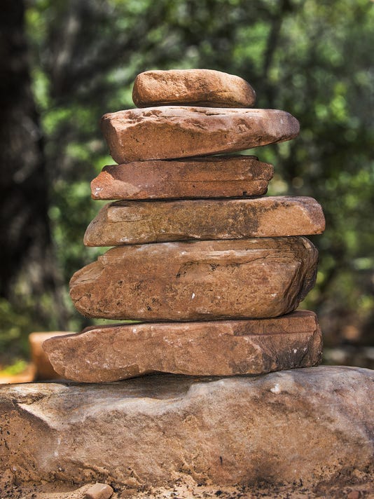 What's with all those stacks of stones in the woods?