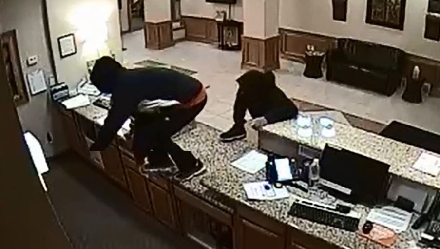 Police looking for two suspects in hotel robbery
