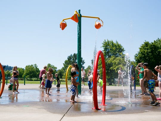 Splash fountains at Riverfront Park offers relief from hot weather