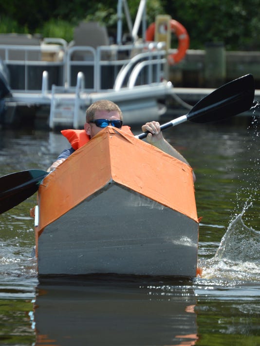 In cardboard boats, float or swim