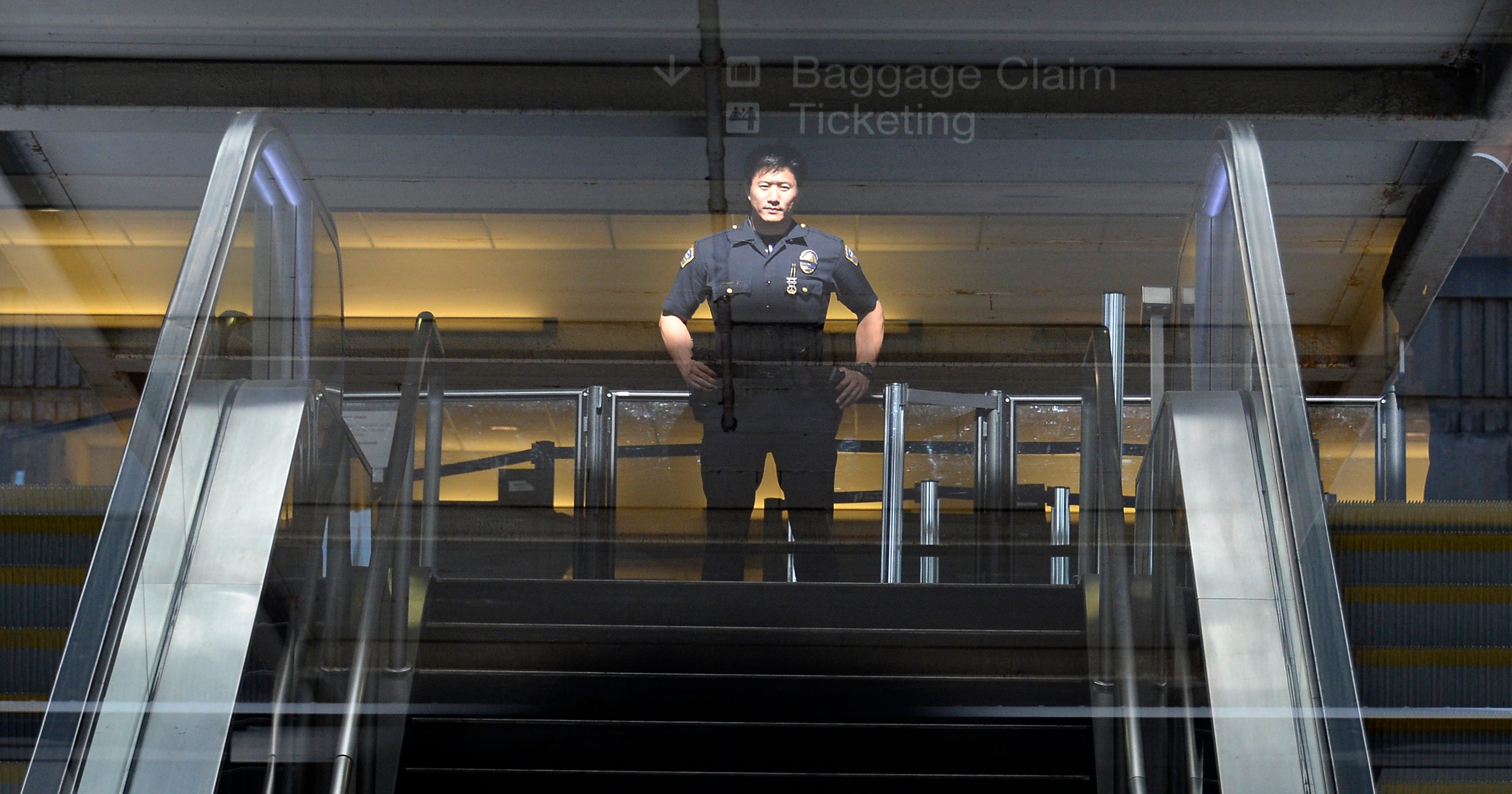 Armed officers at every airport checkpoint? #tellusatoday