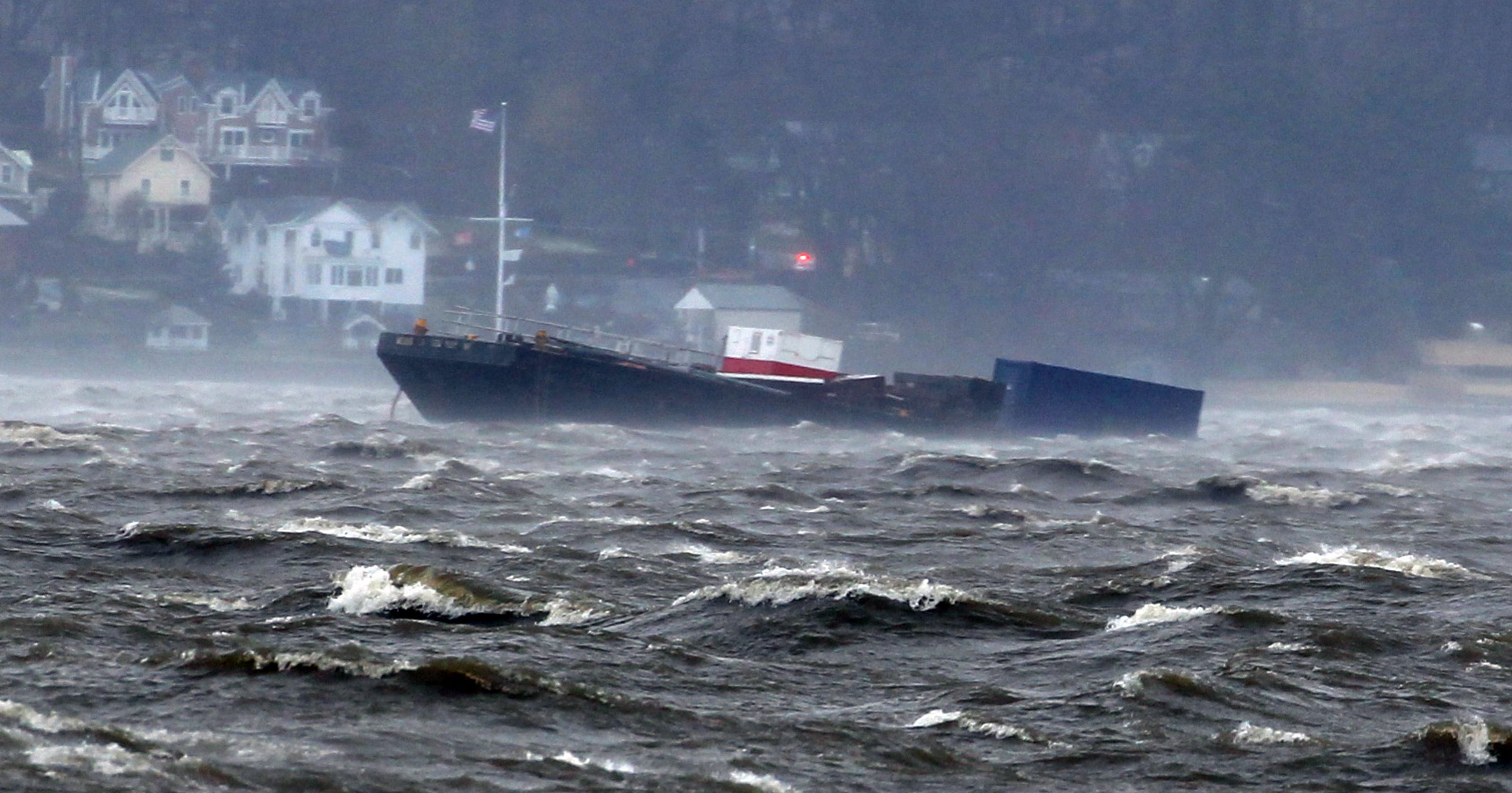 Six barges floating loose in Hudson River off Irvington