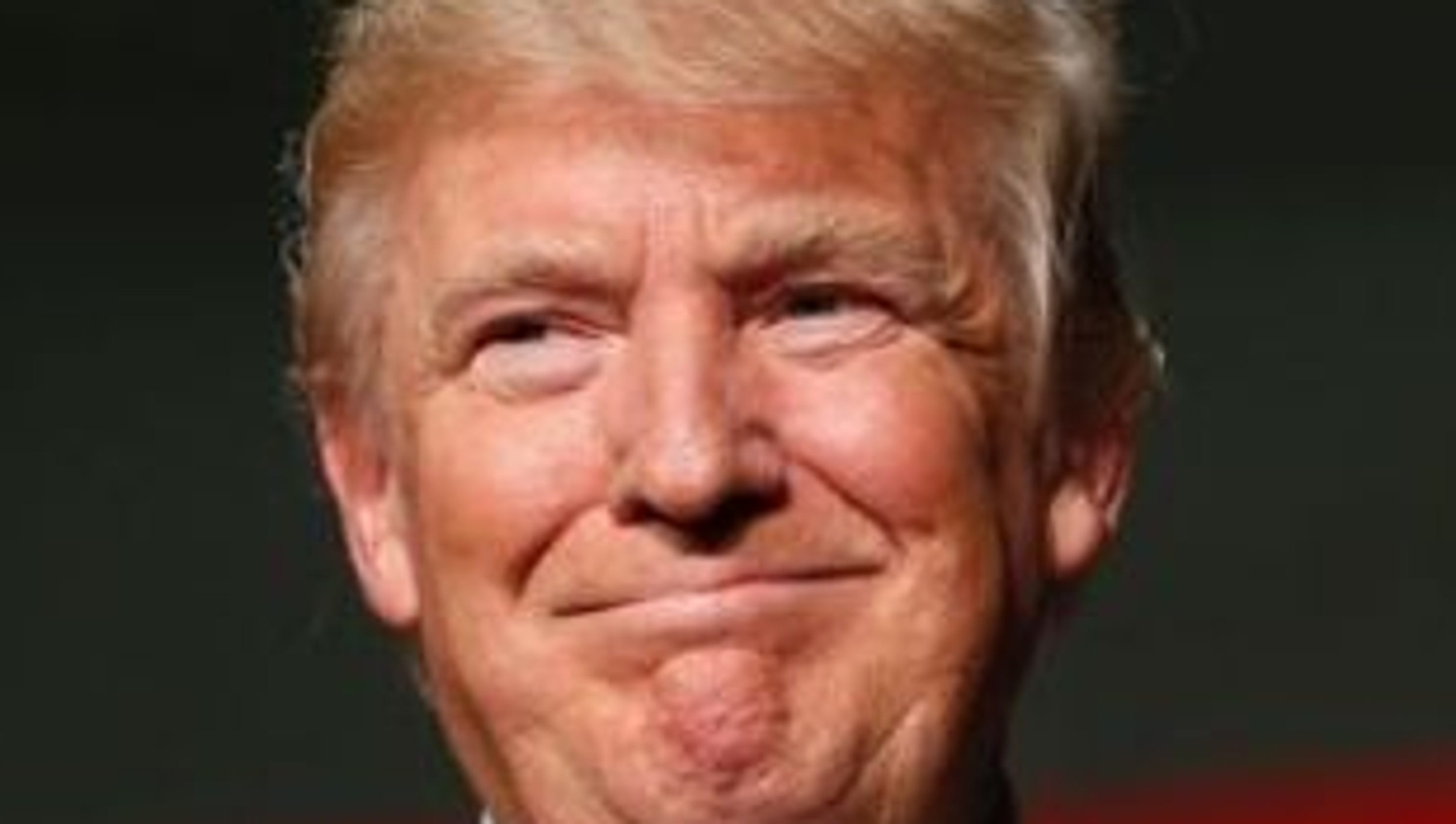 Woman who went viral flipping off Trump's motorcade gets fired