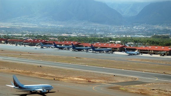 How did Maui airport get OGG code? Exhibit will explain