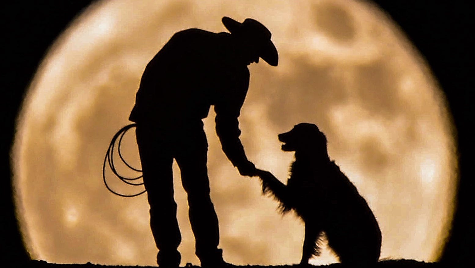 The story behind two photos of a cowboy and a super moon