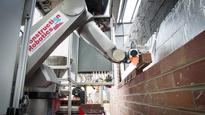 Brick-laying robot on the job in Victor