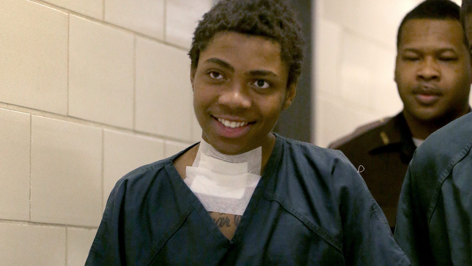 Trapuzzano slaying suspect laughs going to court