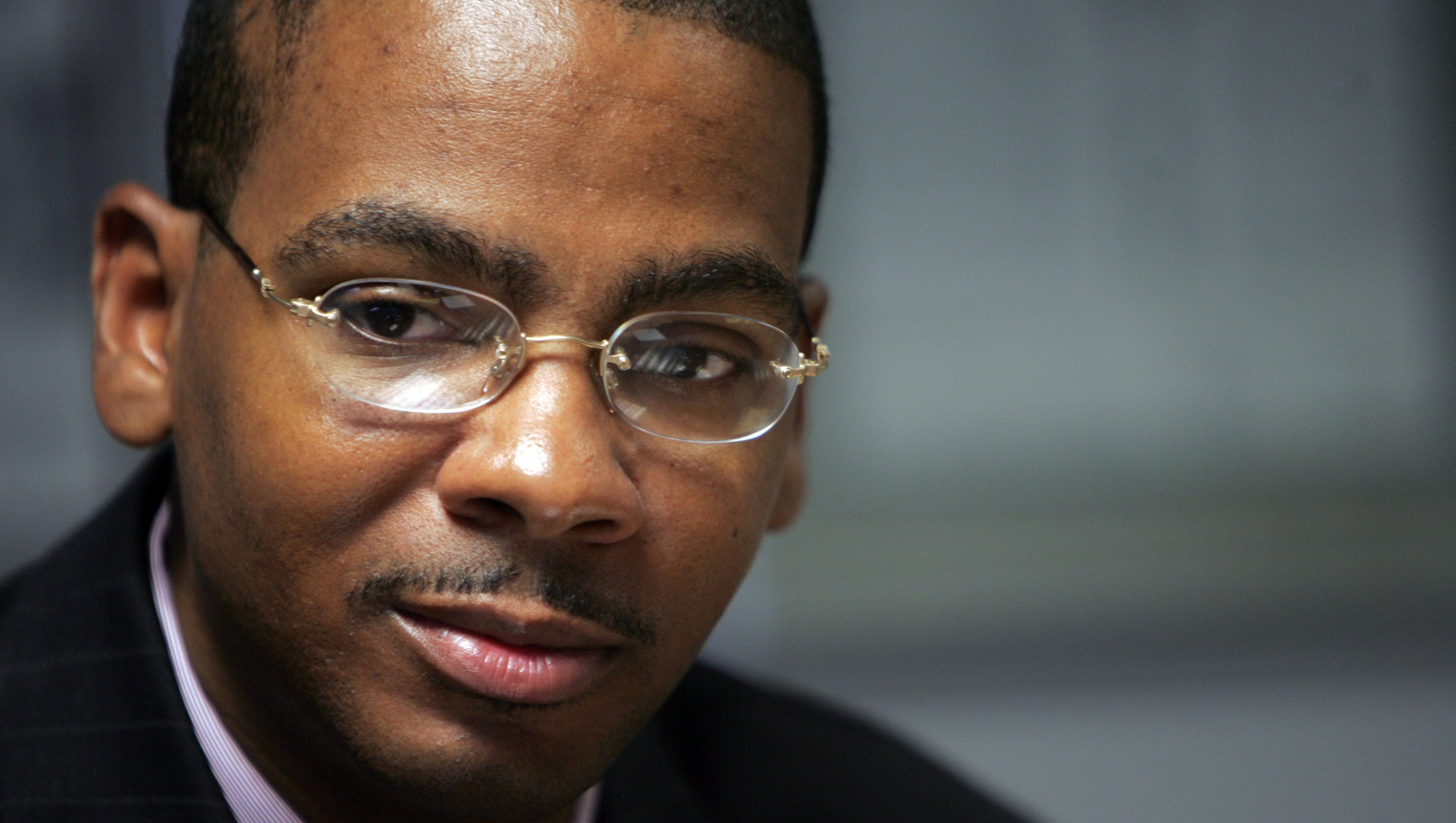 Son of judge, wife arraigned on embezzlement charges