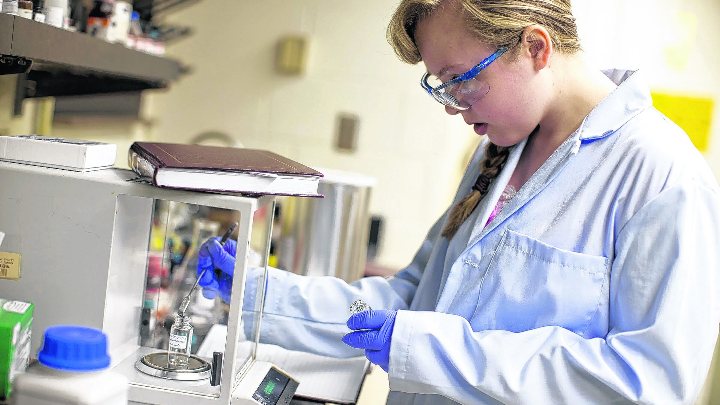 High school kids try lab coats on for size