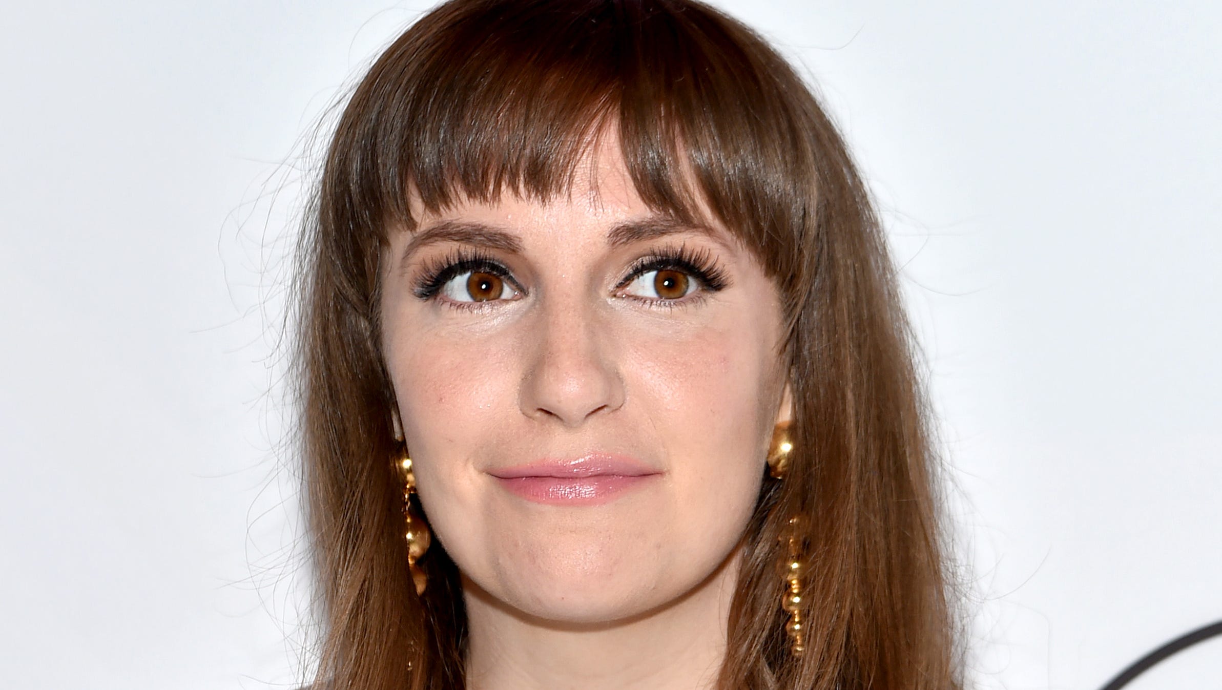 Lena Dunham's 'sick' tattoo to embrace her illness confuses Twitter