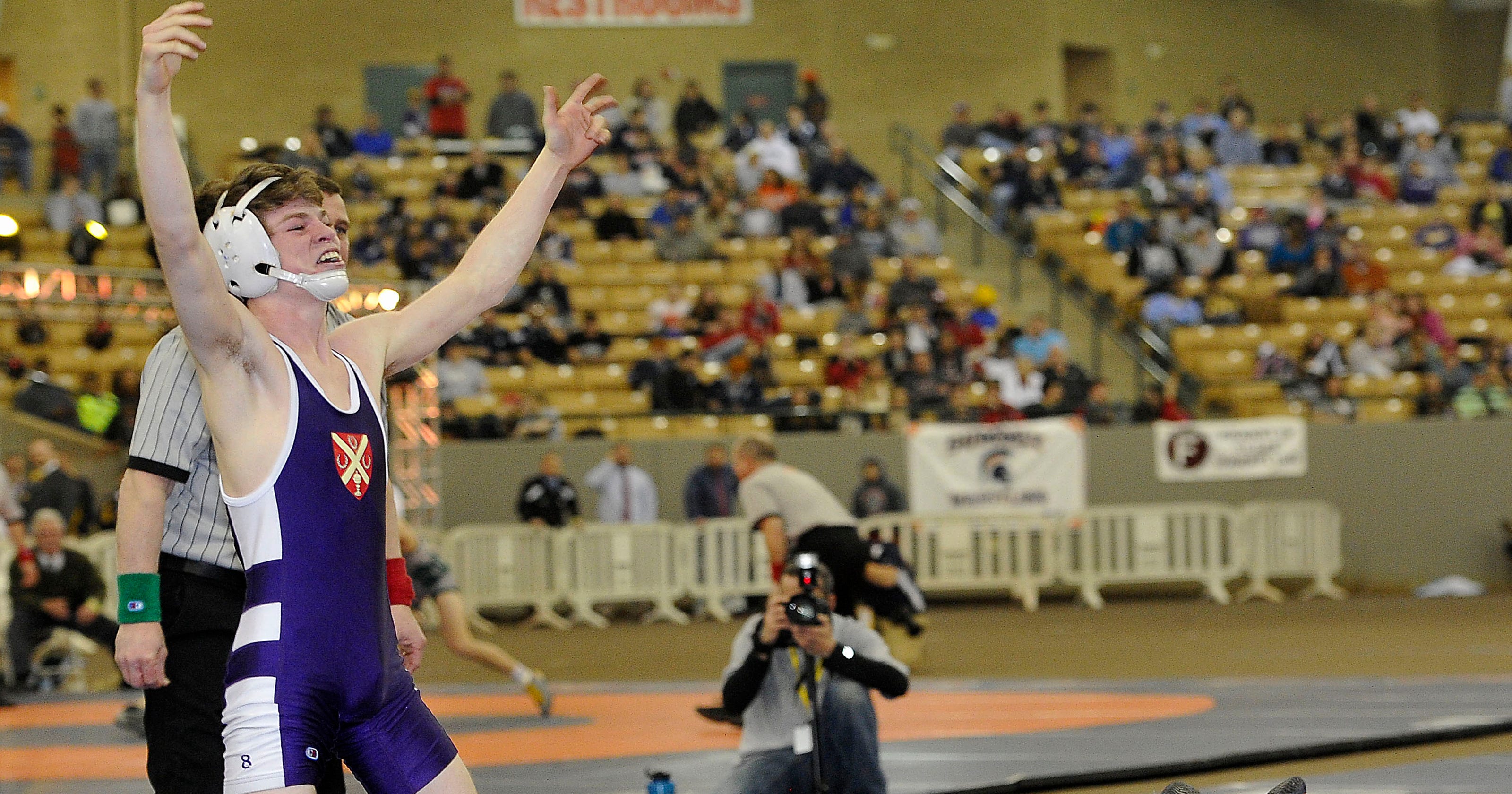 Father Ryan dominates state wrestling tournament