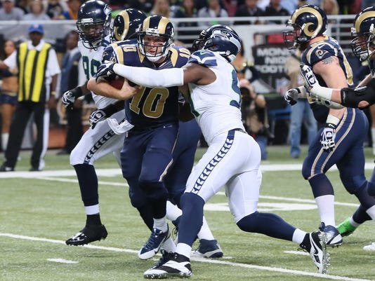 Seahawks stop Rams' surge at goal line on final drive