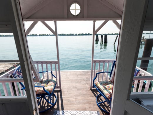 East China man's hand-crafted tiny houseboats are making waves