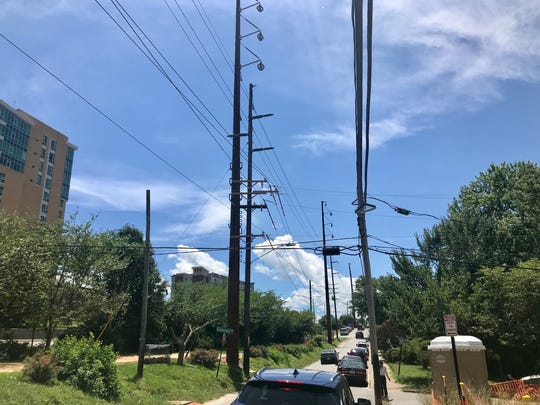 Answer Man: Duke Energy putting up huge, rusty utility poles?